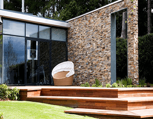 2-story fireplaces Landscape walls Facades Pools Commercial ...